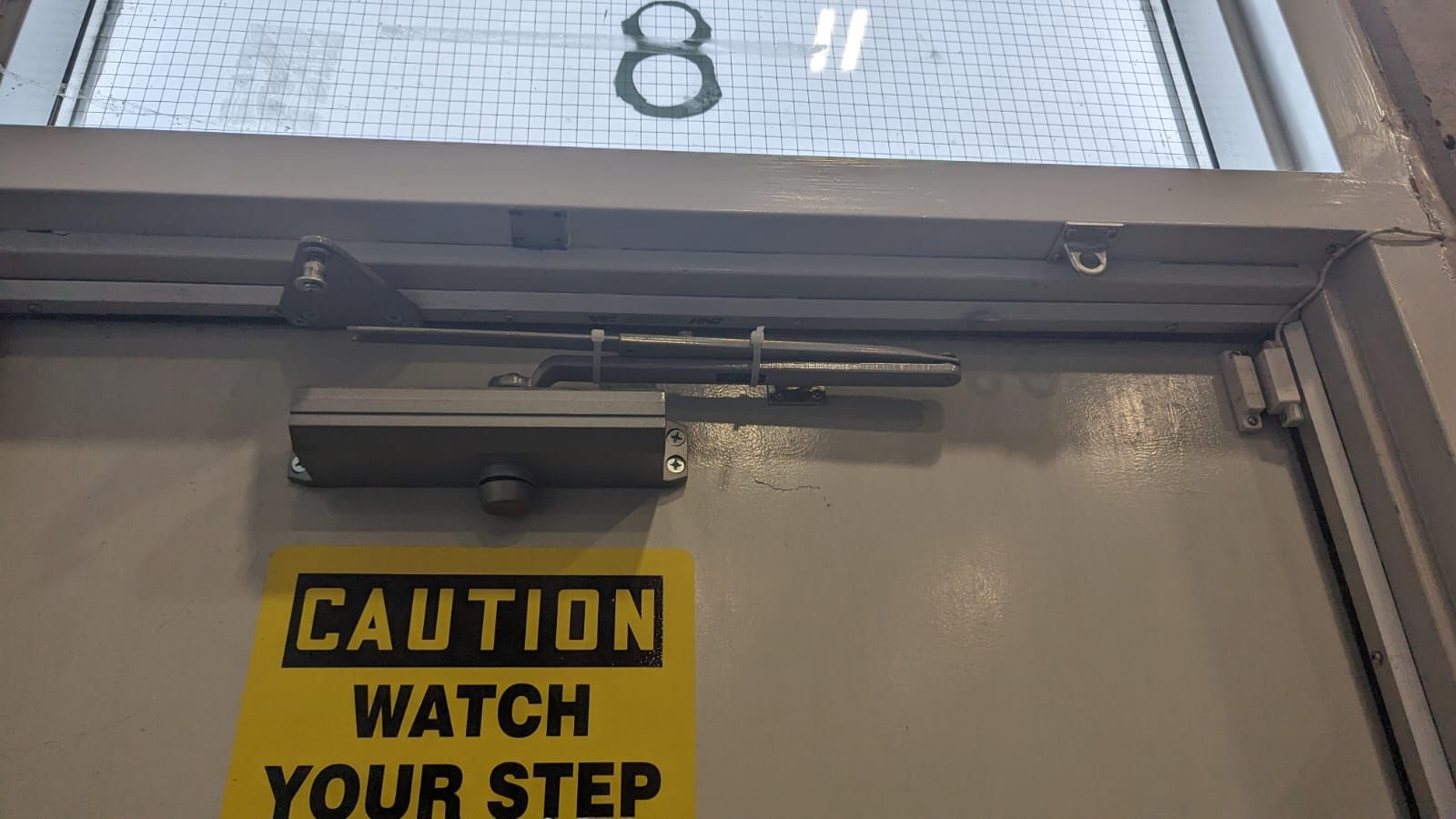 How to Fix a Commercial Door That Won't Close Properly - Delet Door Systems